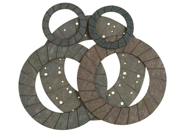 Clutch facings in moulded and woven compositions